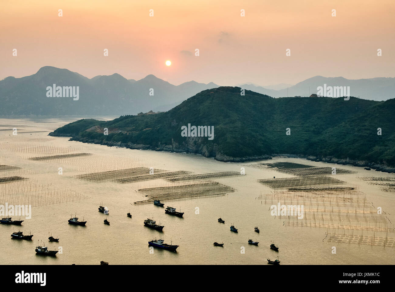 Traditional fishing boats at sunrise, Huazhu, Fujian, China Stock Photo ...