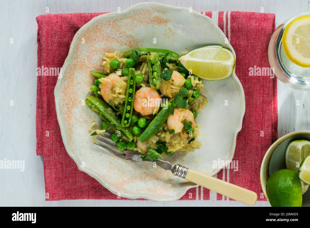Thai prawn and pea pilaf garnished with a slice of lime - top view ...