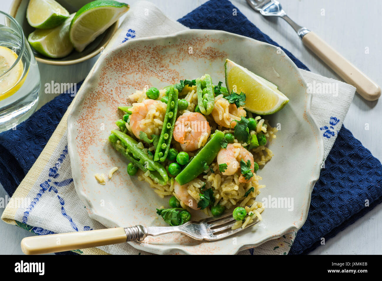 Thai prawn and pea pilaf garnished with a slice of lime - top view ...