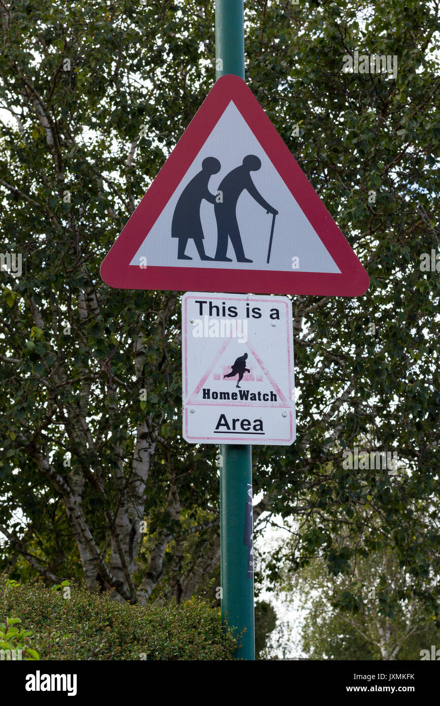 Old people warning red triangular road sign, This is a HomeWatch Area ...