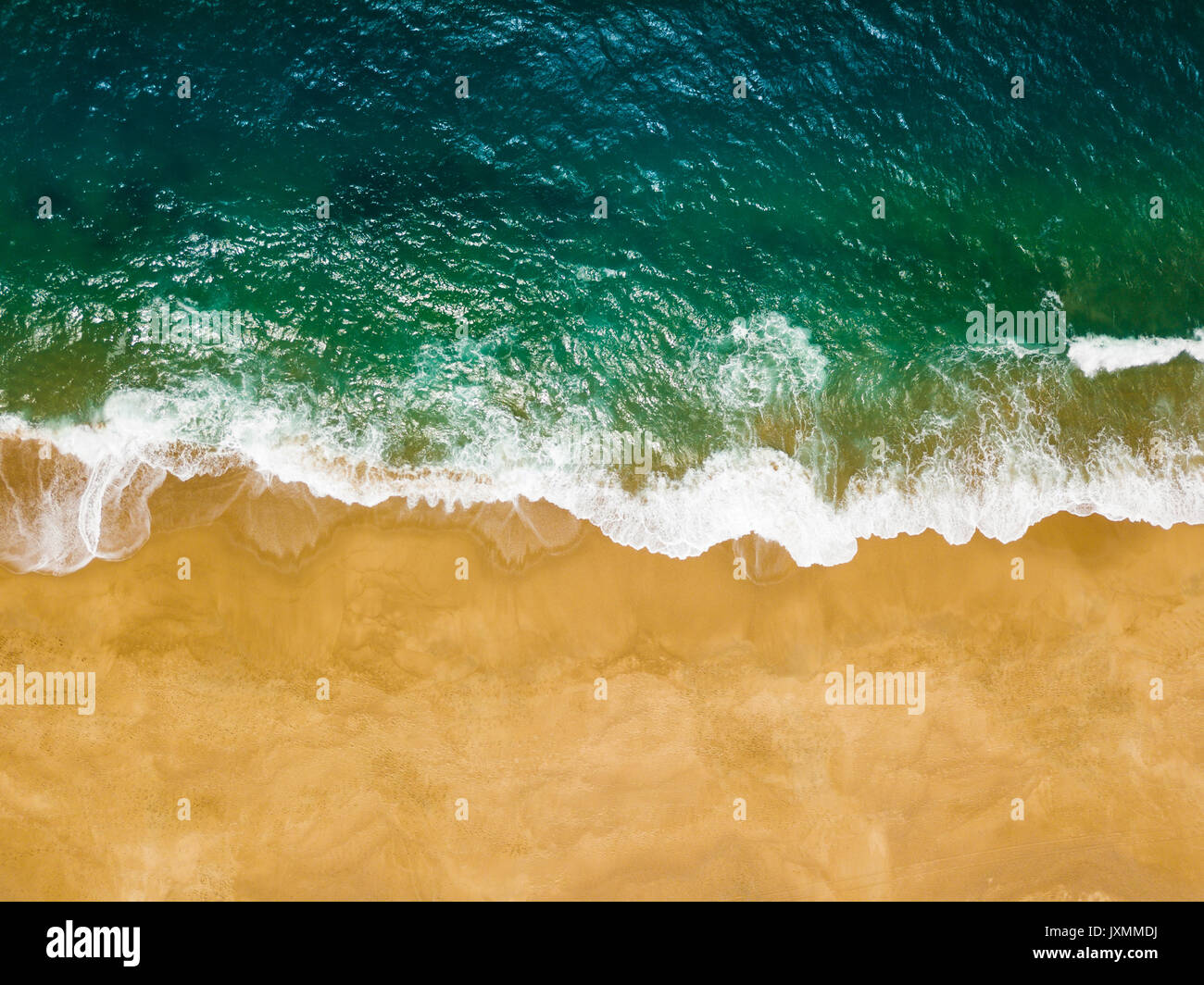 Top view of a deserted beach. The Portuguese coast of the Atlantic ...