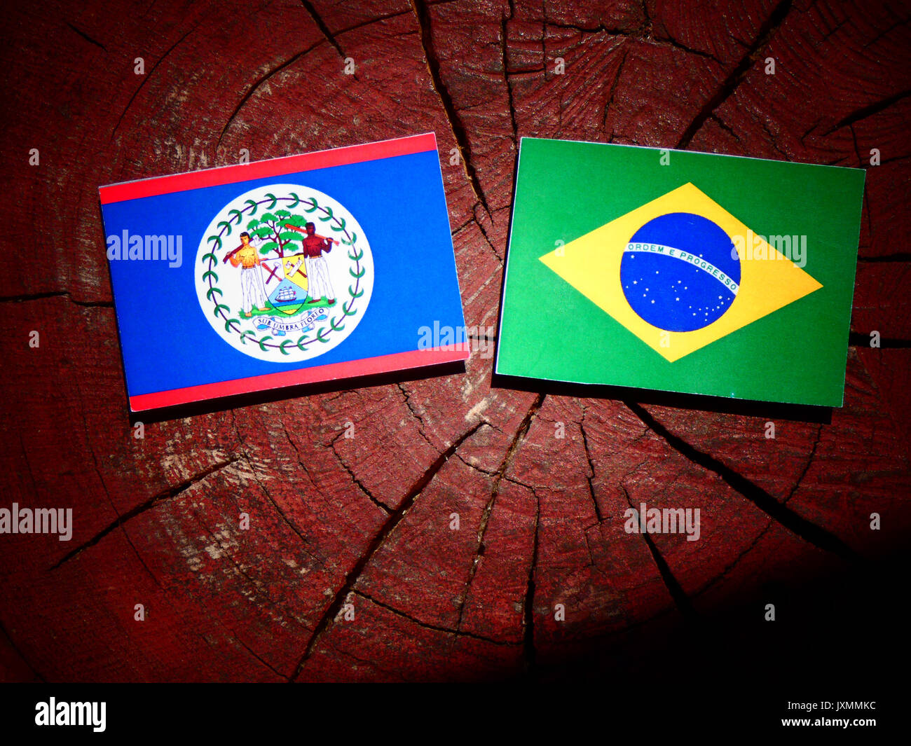 Belize flag with Brazilian flag on a tree stump isolated Stock Photo ...