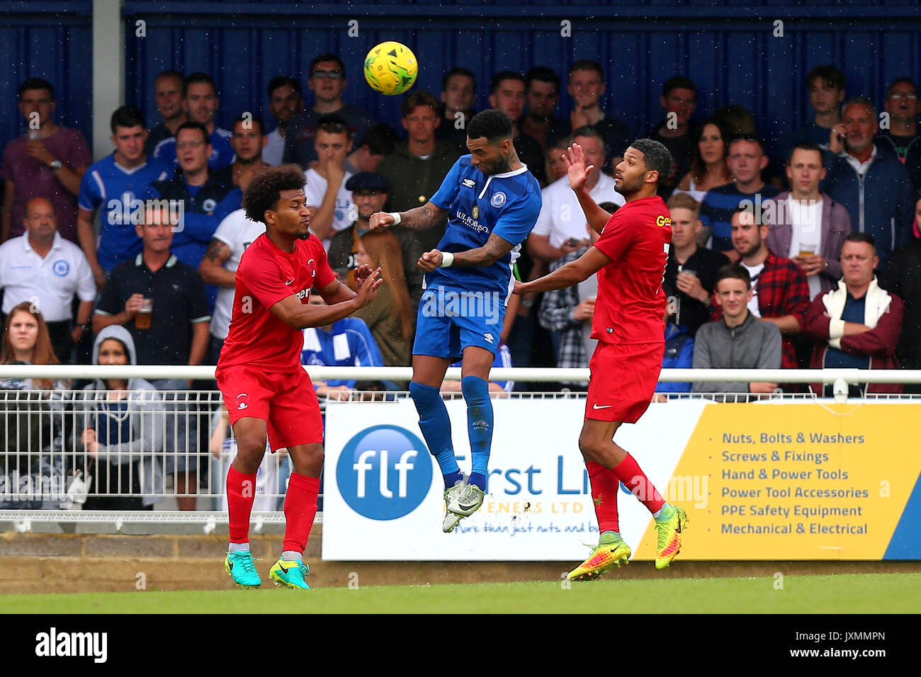 Jermaine Pennant of Billericay Town rises with Joe Widdowson of Leyton ...