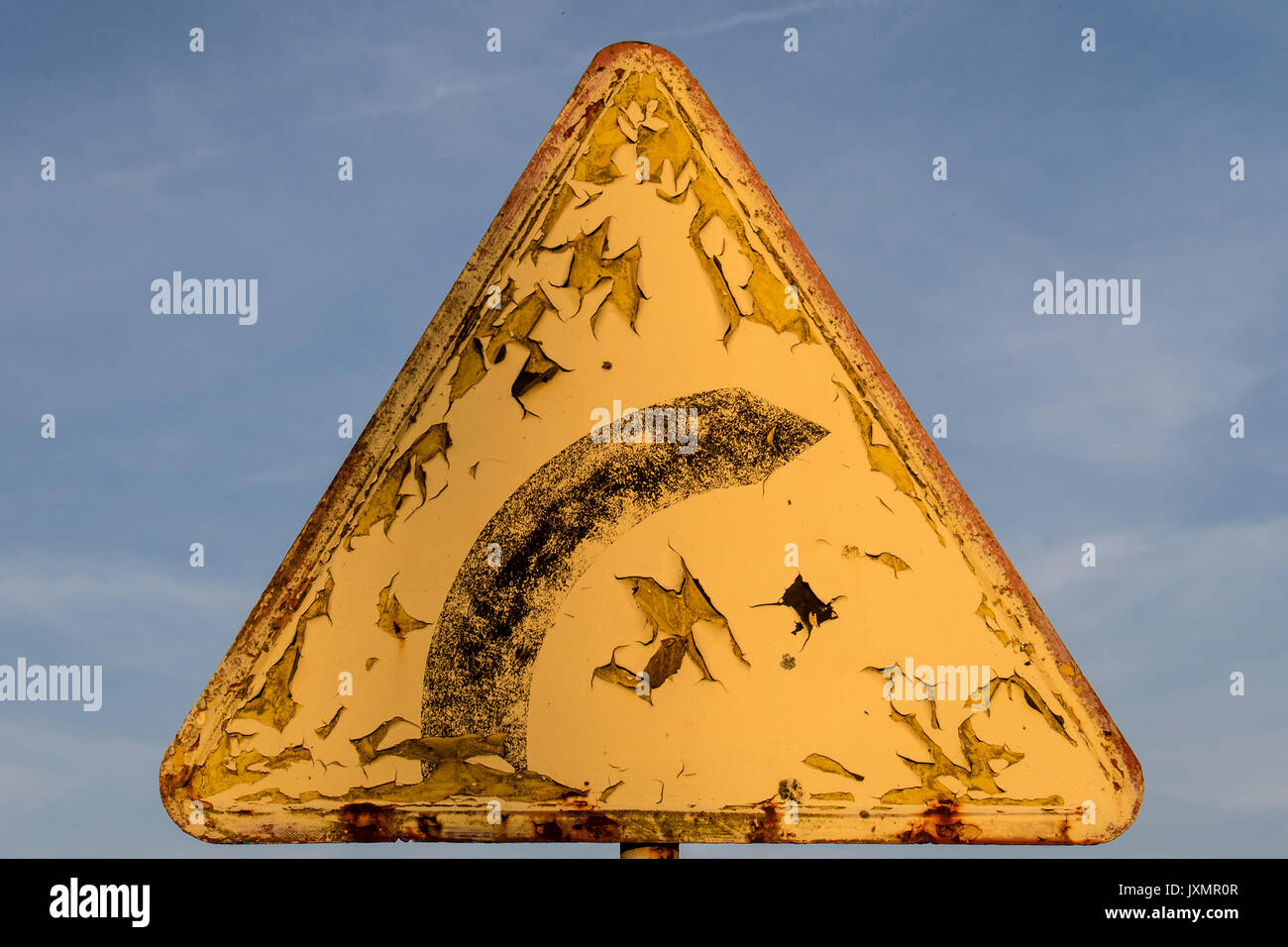 Old road sign, turn right. Sign on sky background. Sign placed on the ...