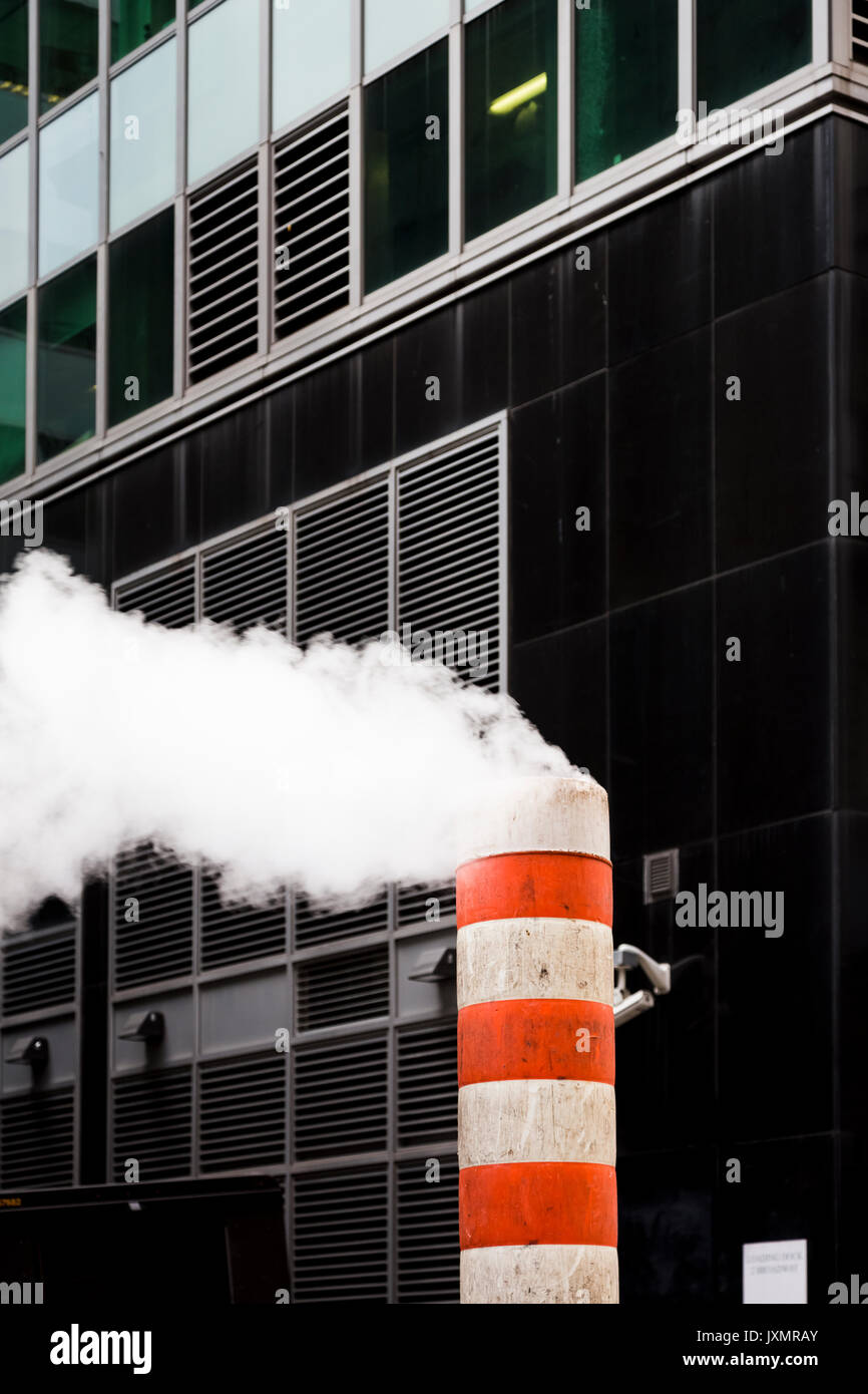 Striped smoke stack and office exterior, Times Square, New York, USA ...
