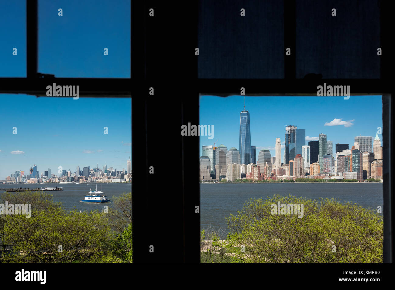 Silhouetted window frame view of Manhattan cityscape and skyline, Times ...