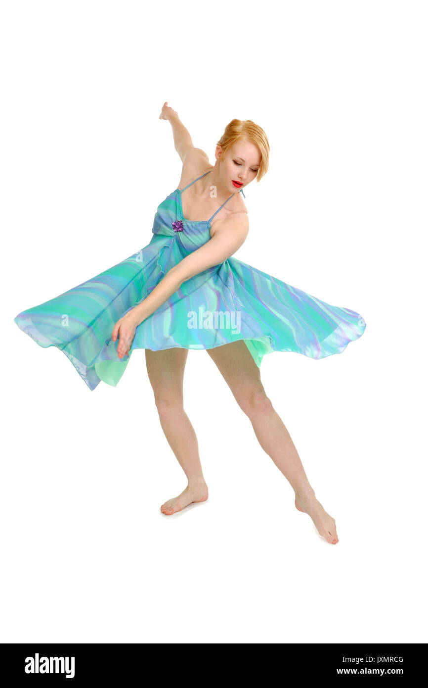 Graceful Dancer with Floating Dress Stock Photo - Alamy