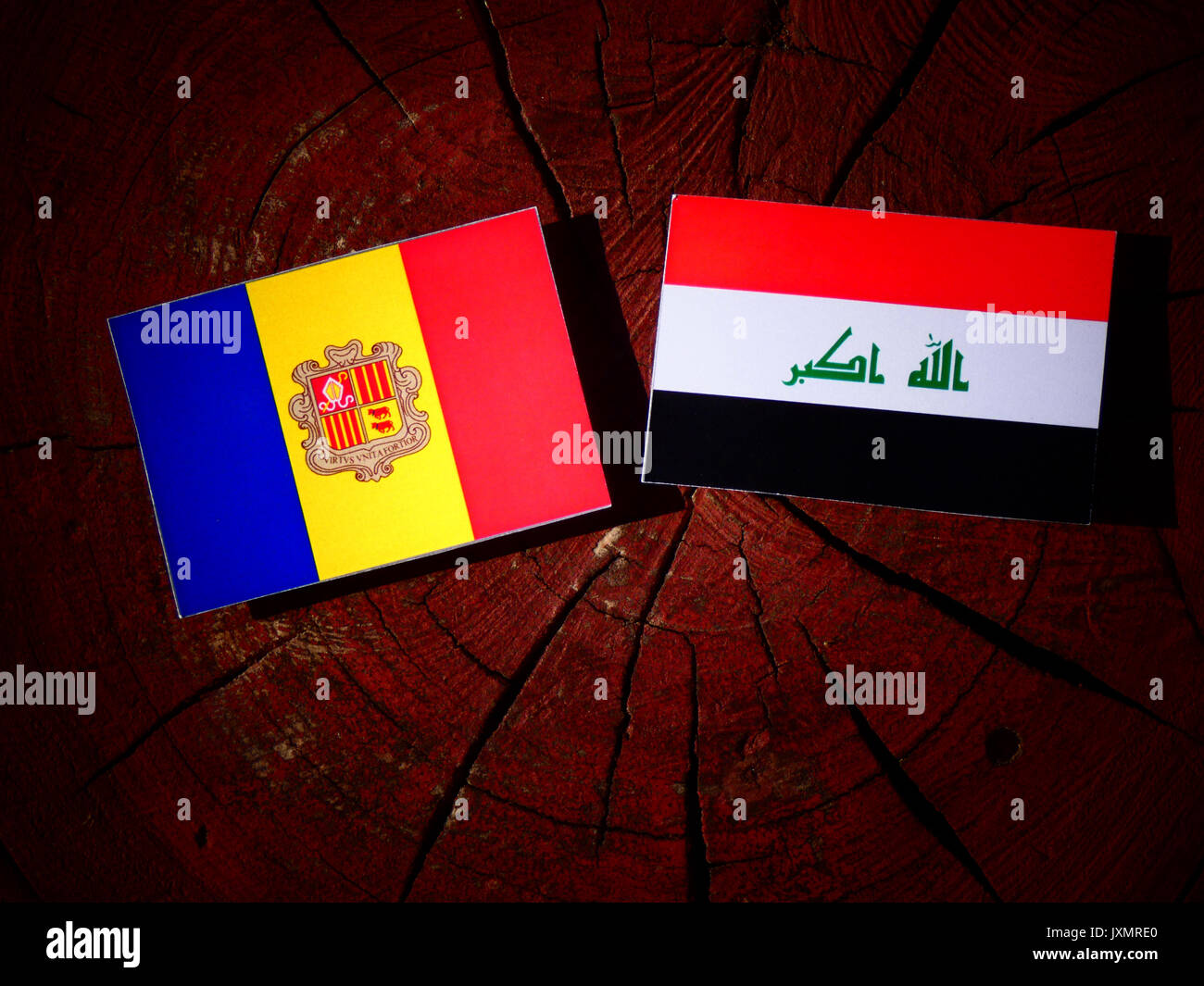 Andorra flag with Iraqi flag on a tree stump isolated Stock Photo - Alamy