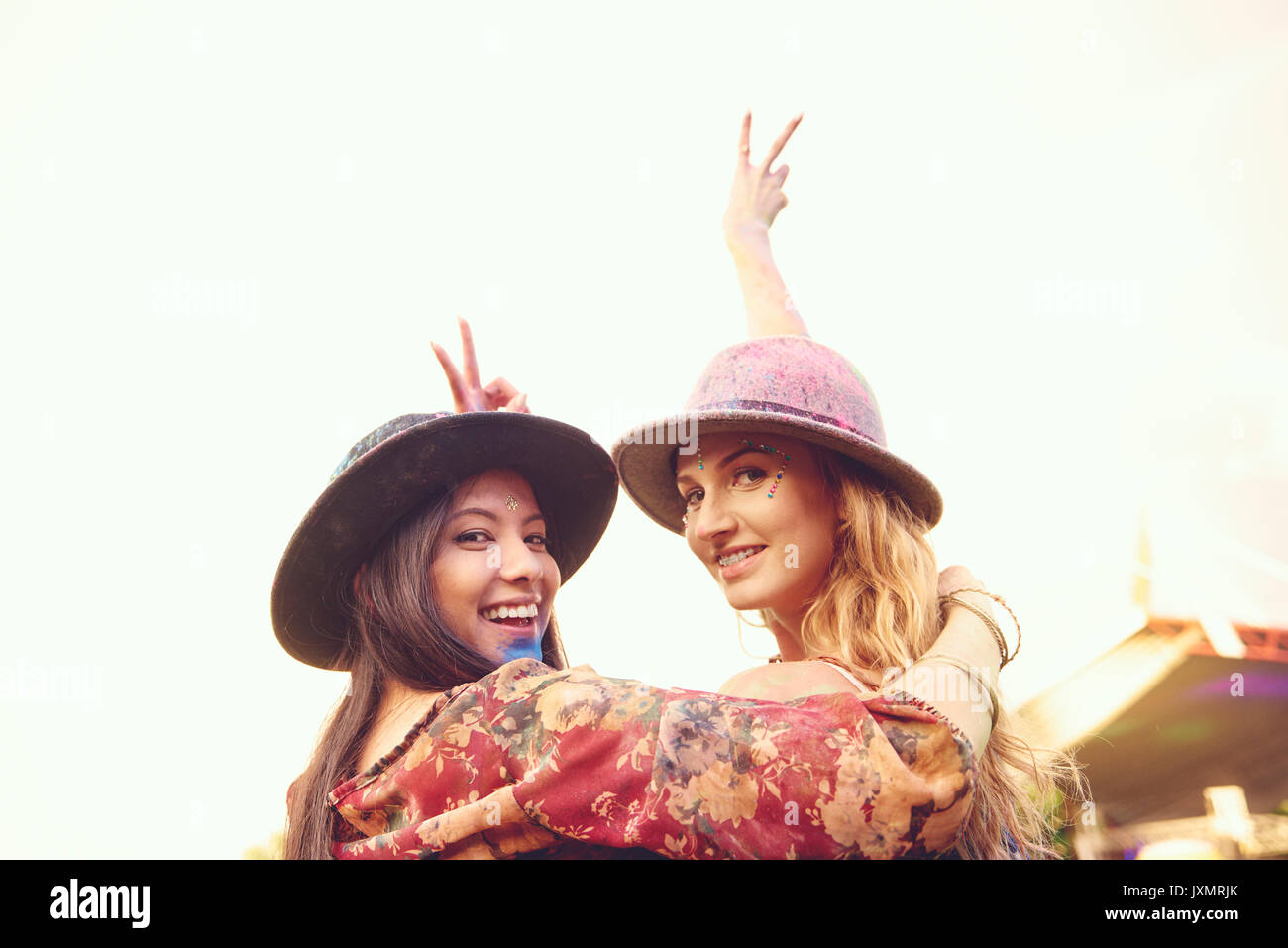 Peace sign over head hi-res stock photography and images - Alamy