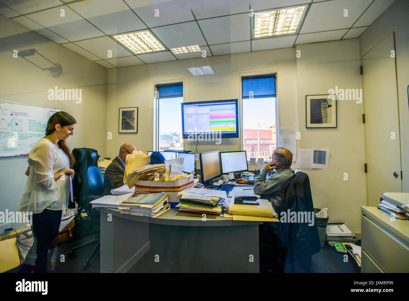 Three male office workers hi-res stock photography and images - Alamy