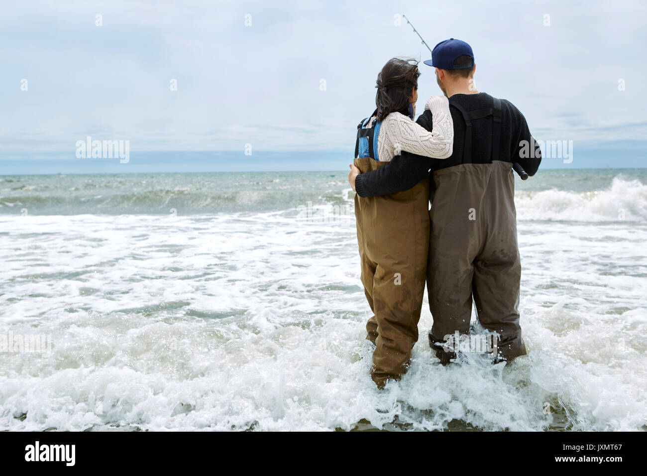 Woman fishing rear view hi-res stock photography and images - Alamy