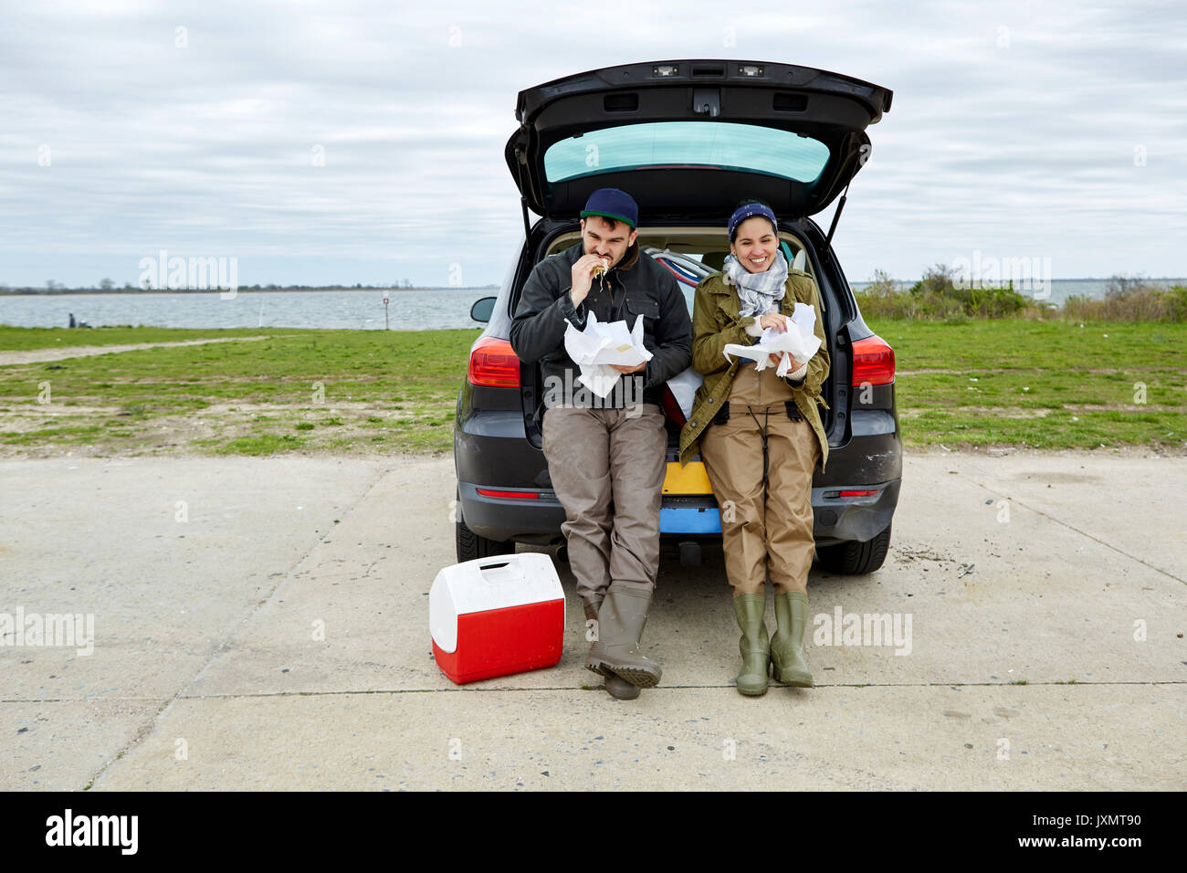 Couple and boot of car and food hi-res stock photography and images - Alamy