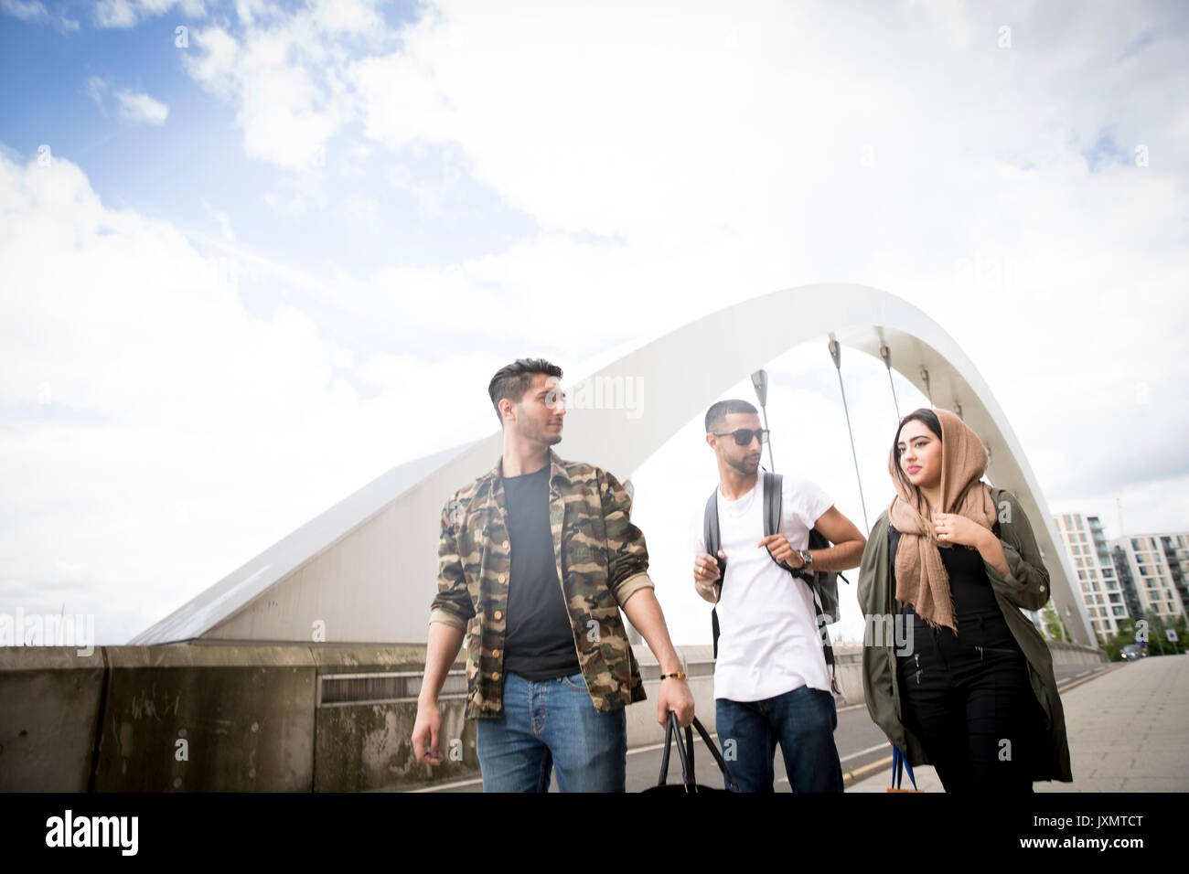 Friends young adults walking hi-res stock photography and images - Alamy