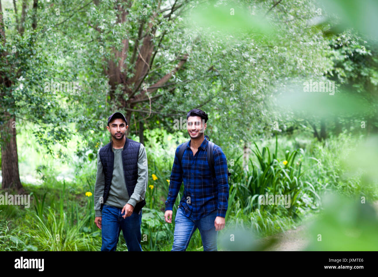 Two friends walking hiking hi-res stock photography and images - Alamy