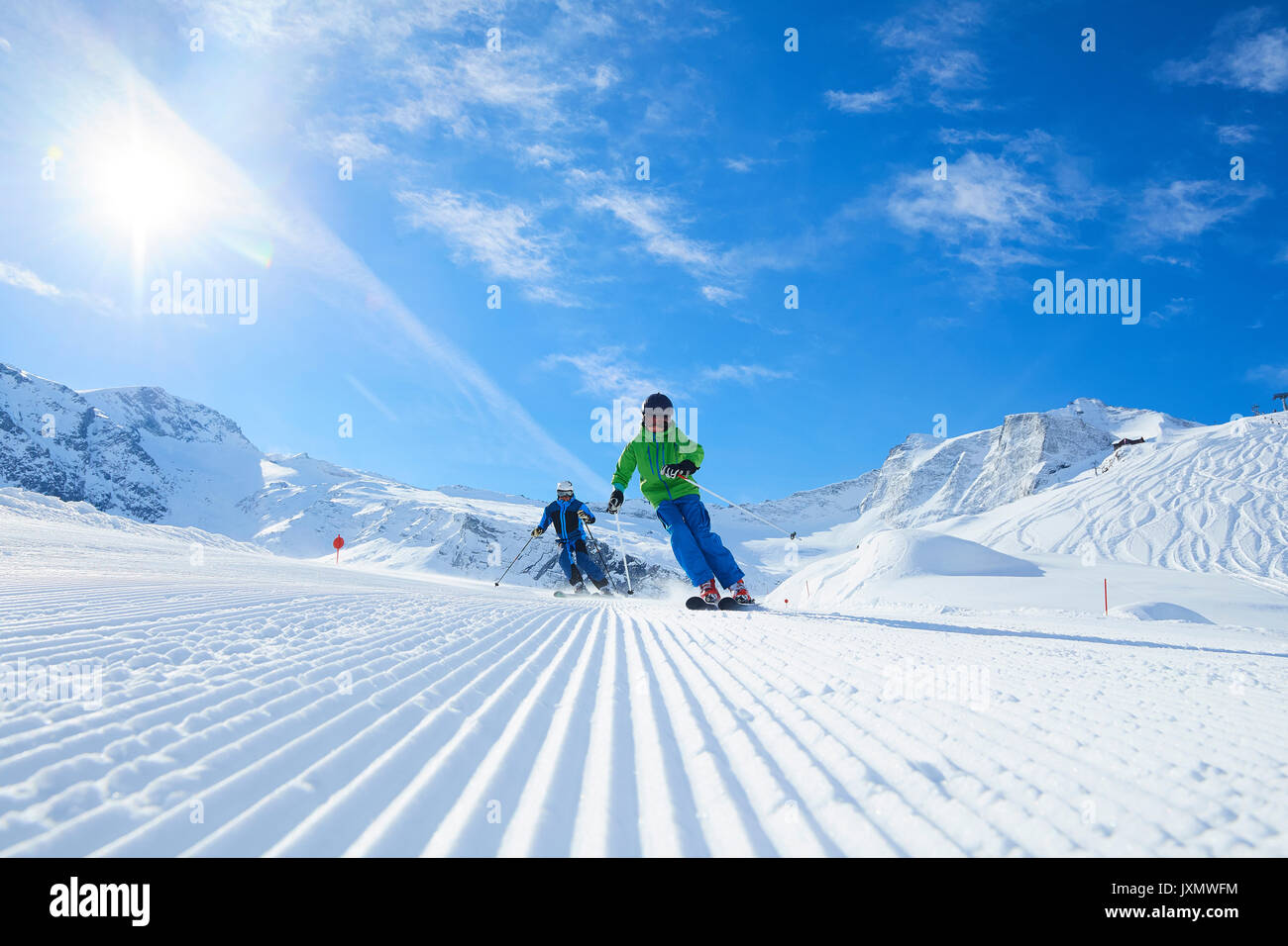 Father and son skiing hi-res stock photography and images - Alamy