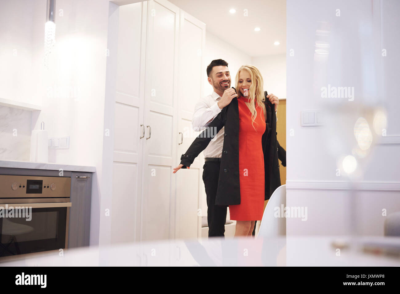 Taking coat hi-res stock photography and images - Alamy