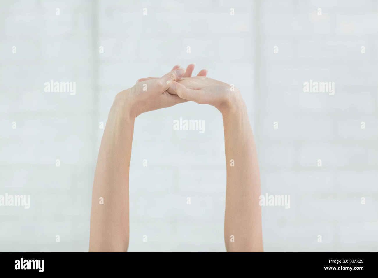 Close up woman stretching arms hi-res stock photography and images - Alamy