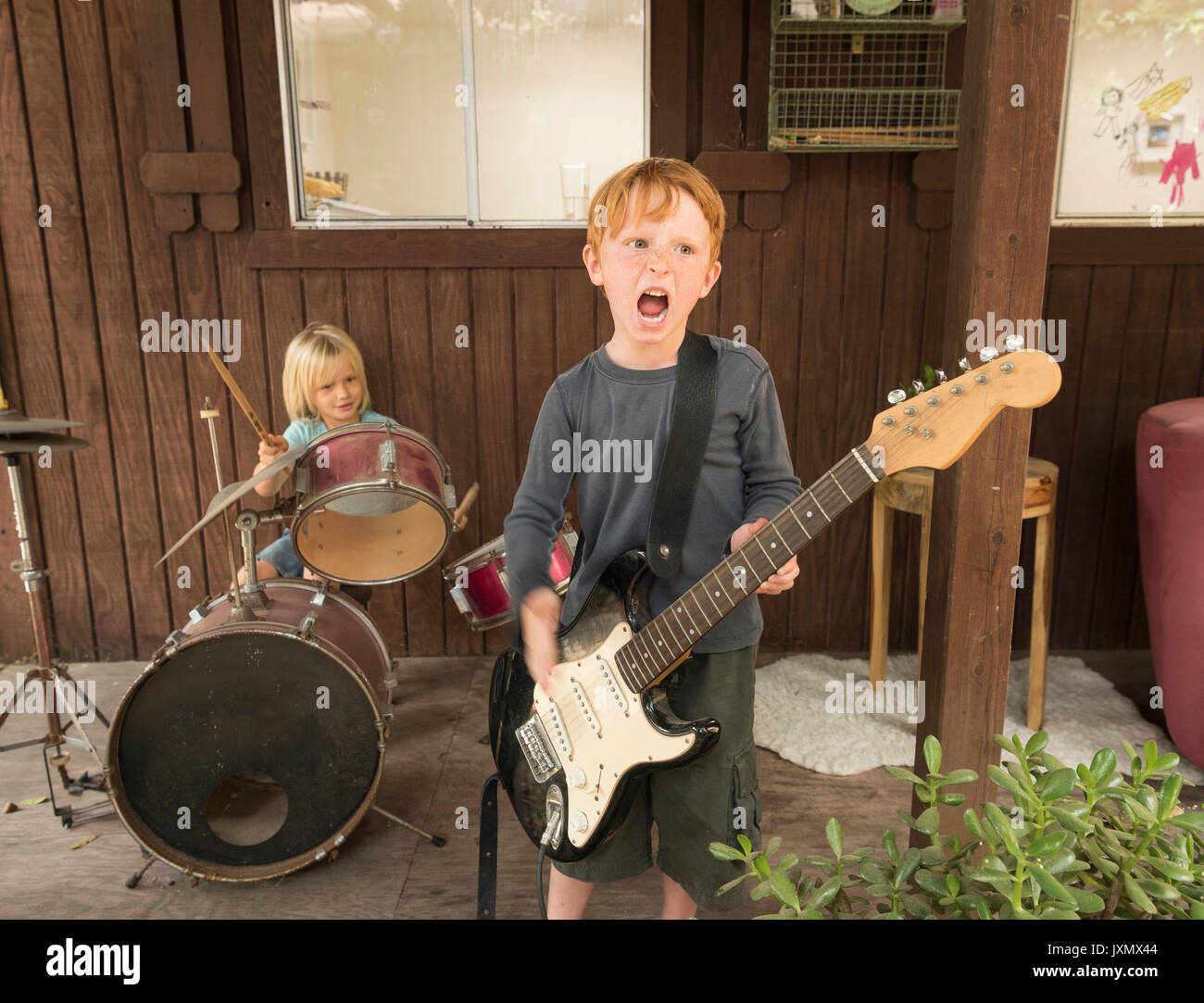 Children playing drums hi-res stock photography and images - Alamy