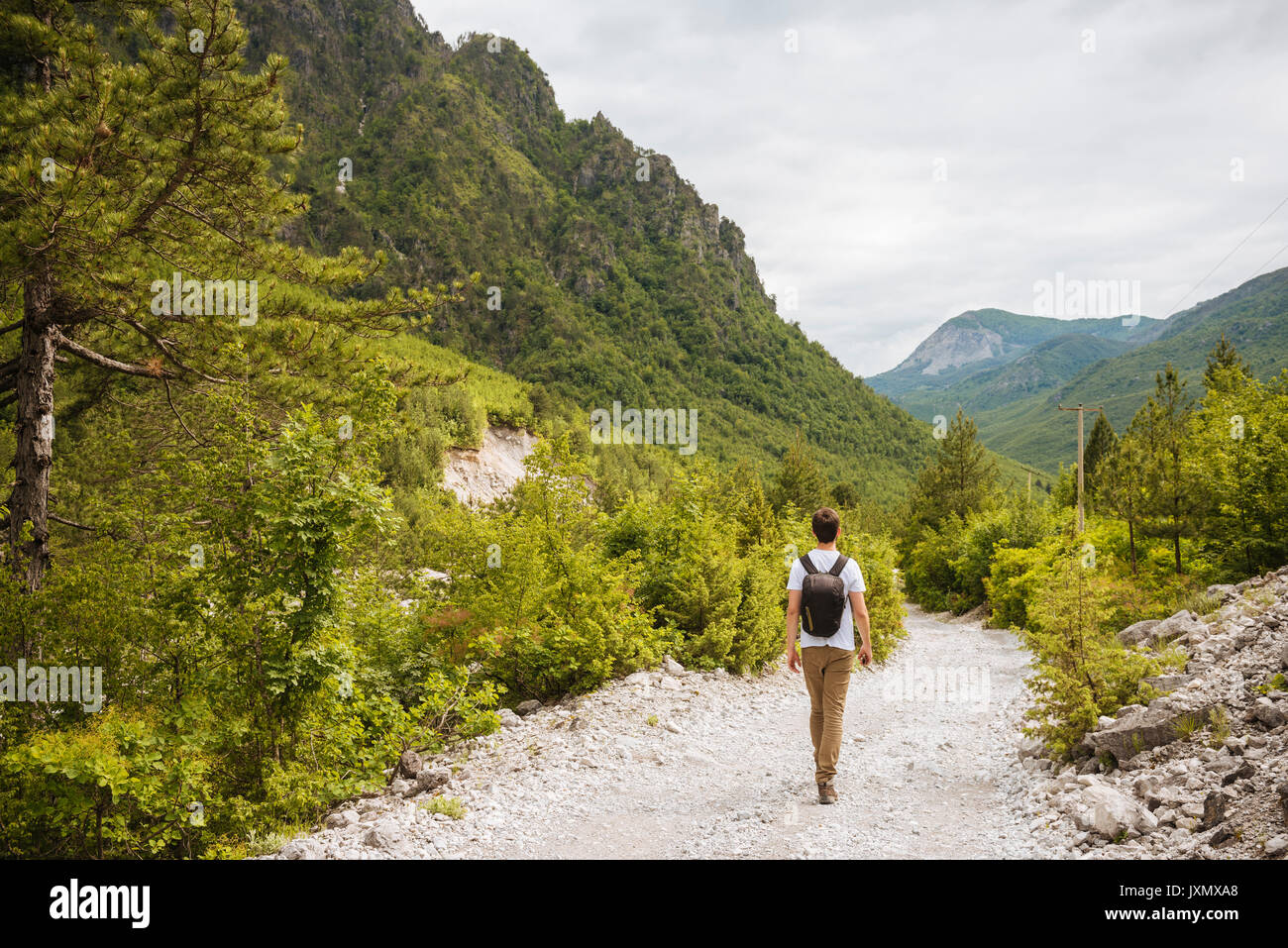 Hiker hiking in Accursed mountains, Theth, Shkoder, Albania, Europe ...