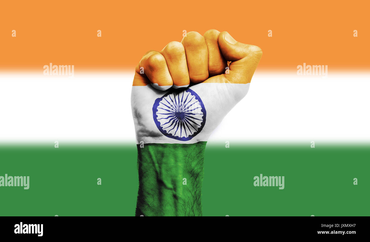India flag painted on a clenched fist. Strength, Power, Protest concept ...