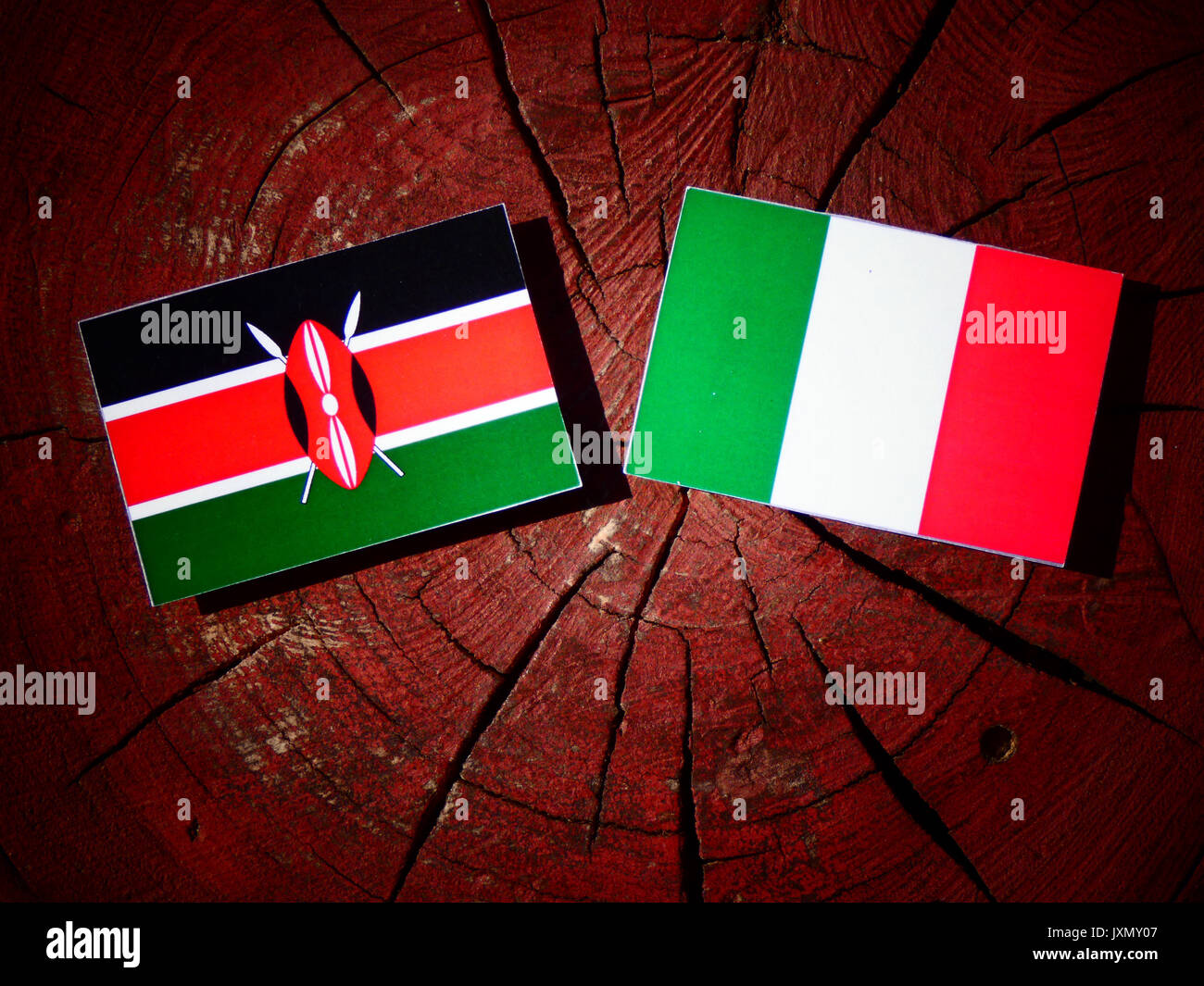 Kenyan flag with Italian flag on a tree stump isolated Stock Photo - Alamy