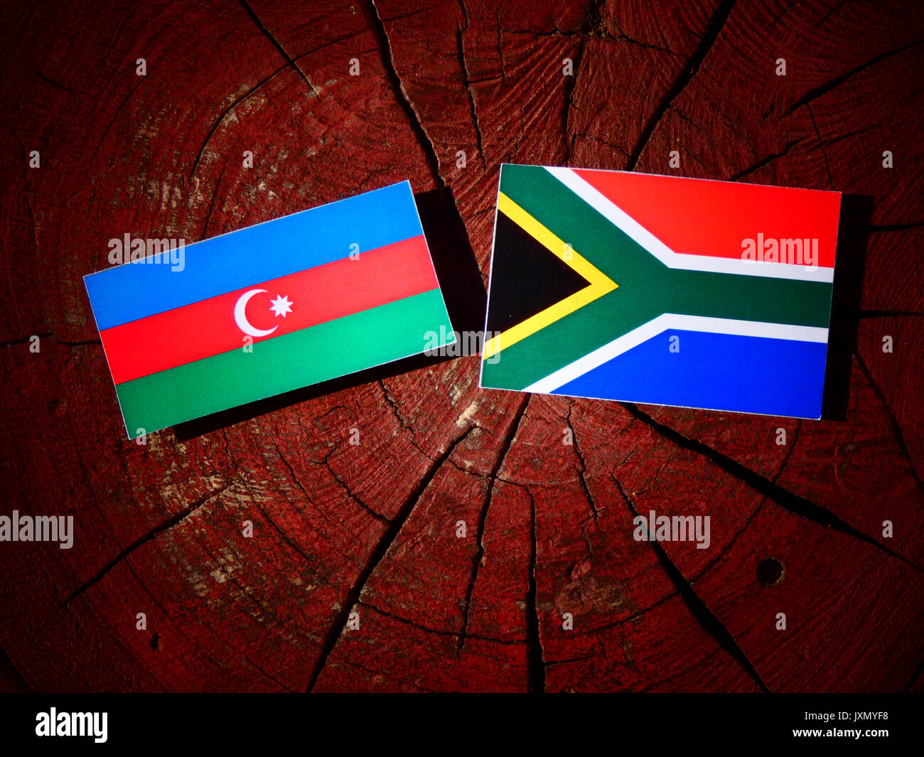 Azerbaijan flag with South African flag on a tree stump isolated Stock ...