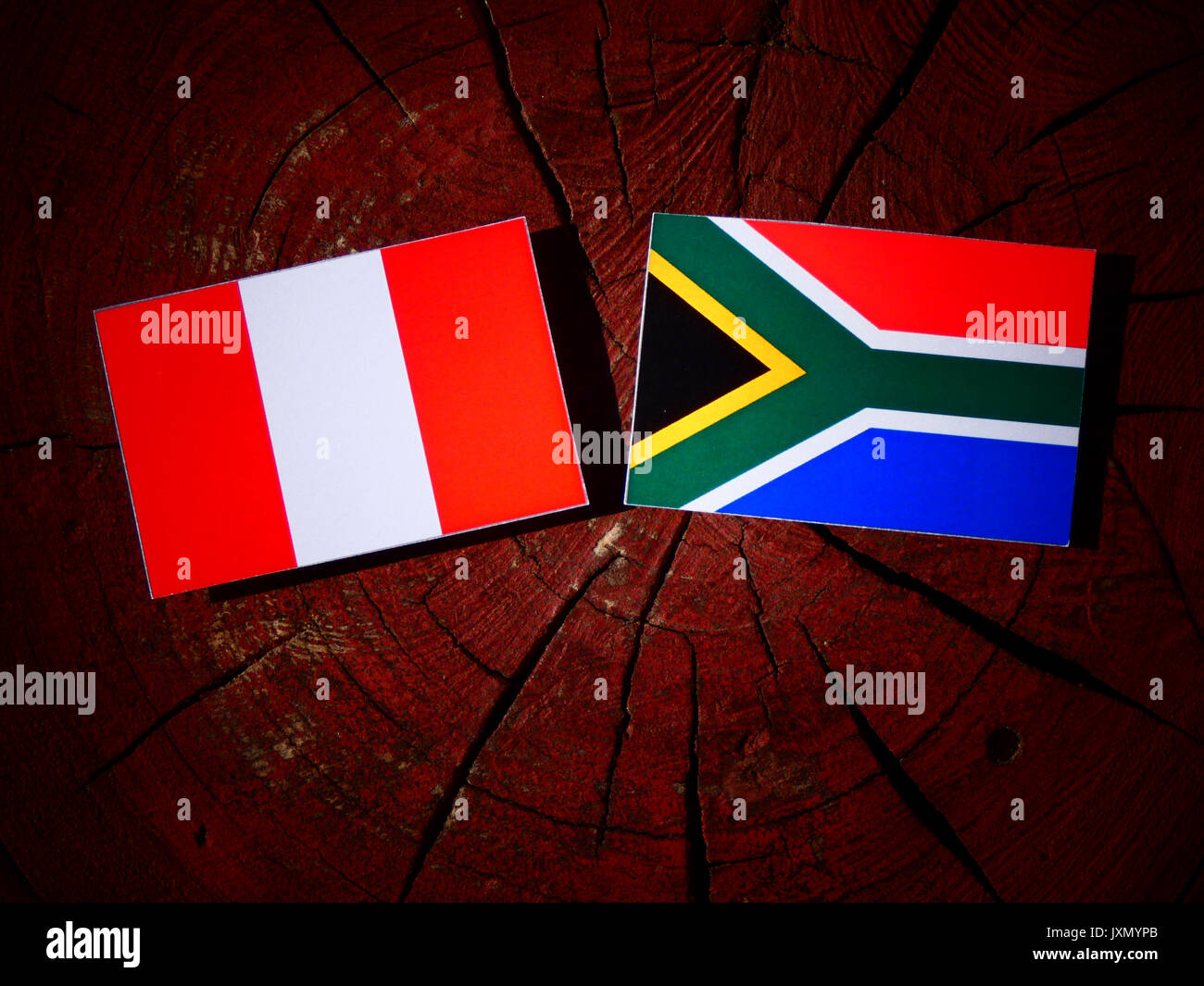 Peruvian flag with South African flag on a tree stump isolated Stock ...