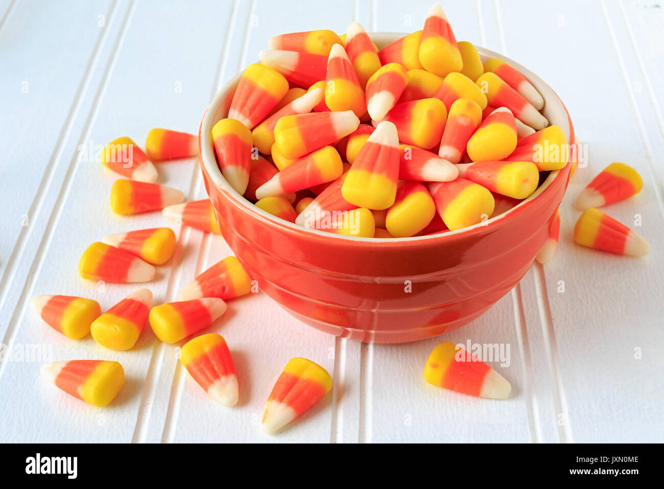 Candy corn in a ceramic bowl Stock Photo - Alamy