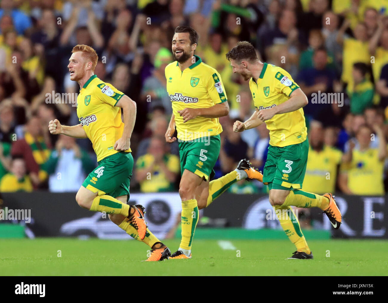 Norwich City's Harrison Reed (left) celebrates scoring their second ...