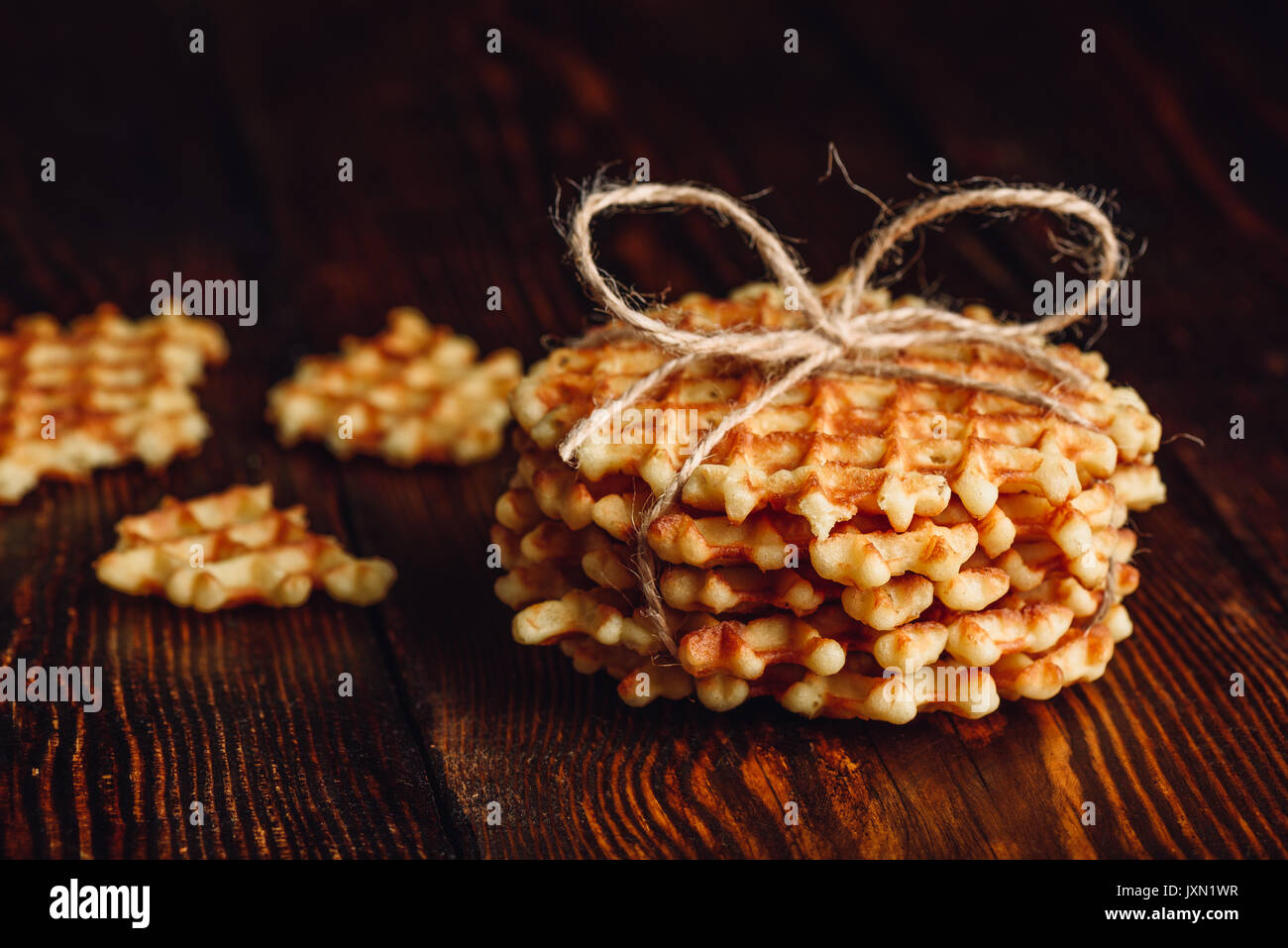 Belgian Waffles Stack with Pieces of Waffle Stock Photo - Alamy