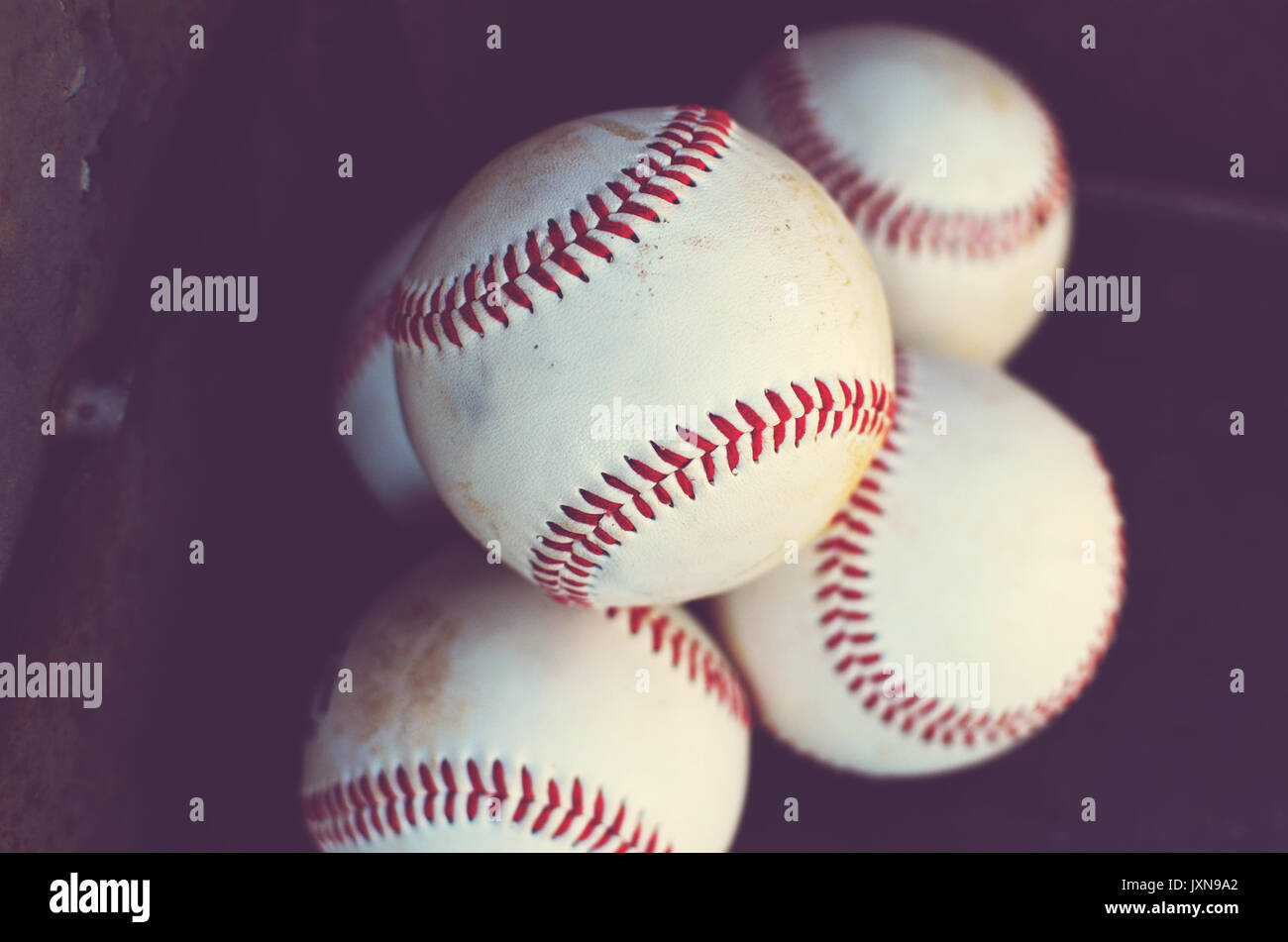 Pile of baseballs laid out for ball player, equipment needed for the ...