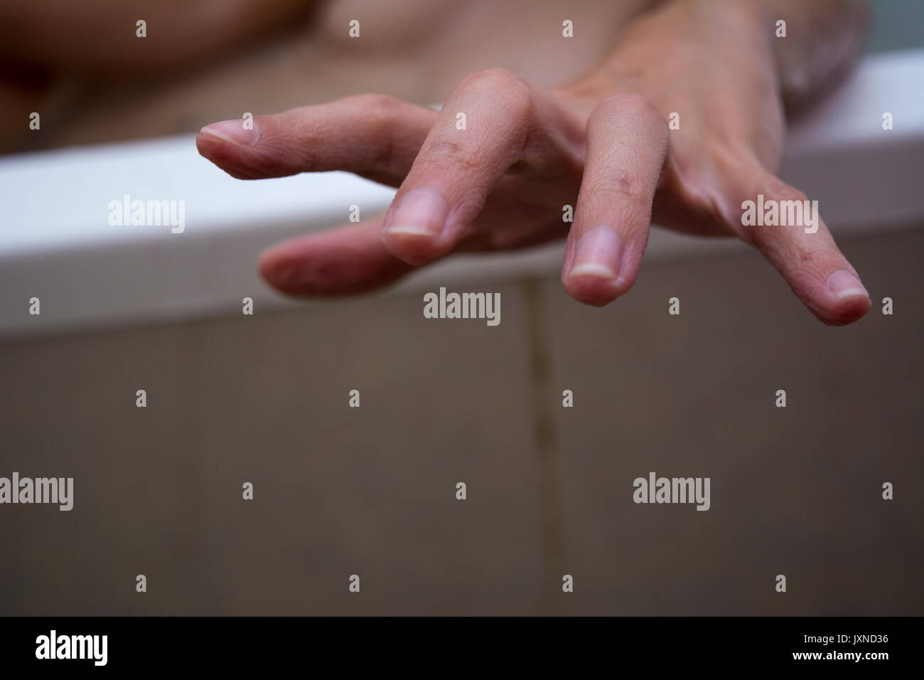 Hand coming out of water hi-res stock photography and images - Alamy