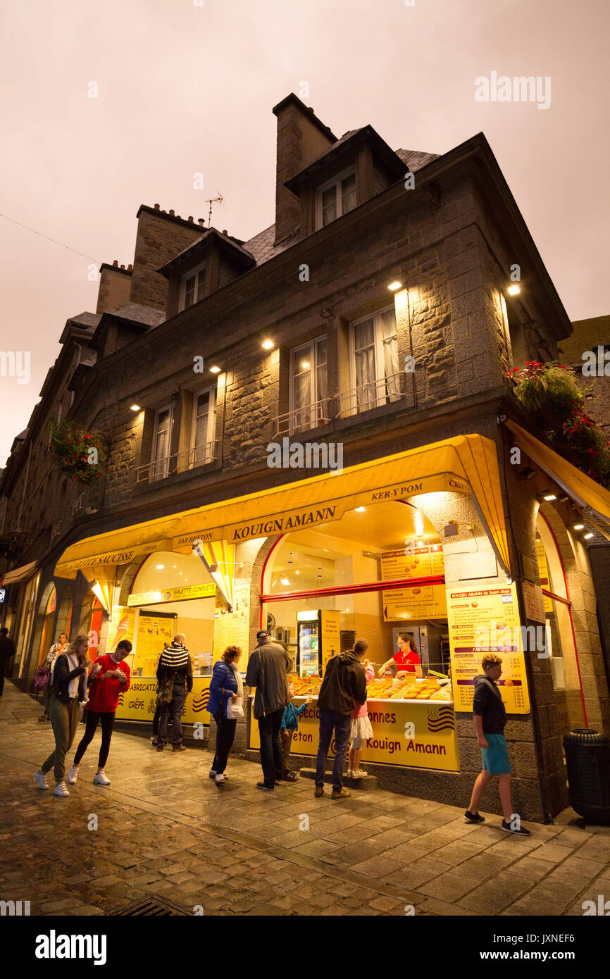 St Malo France - people at a french cafe in the walled town at dusk ...