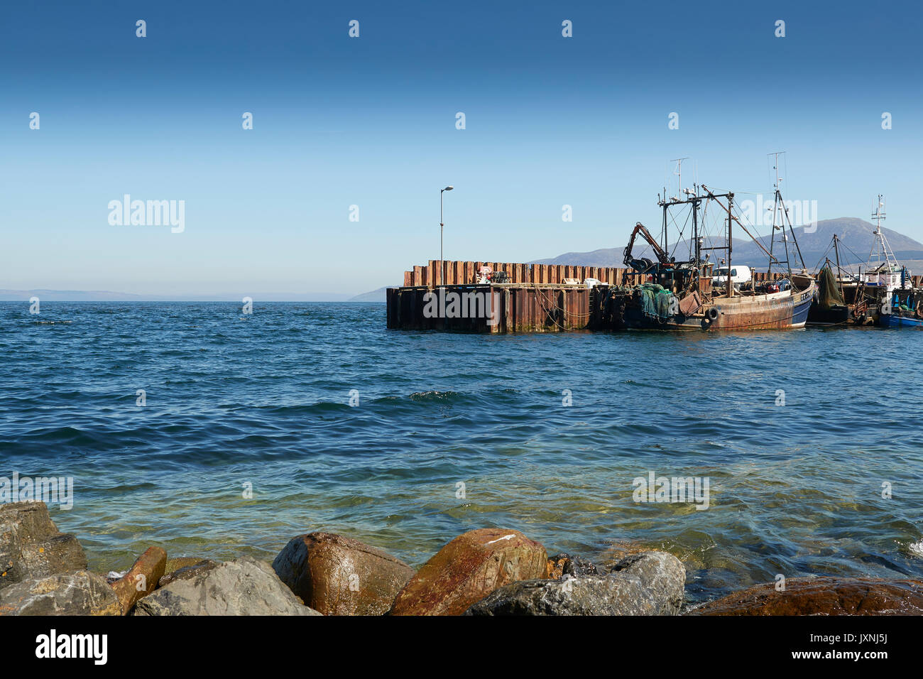 Commercial Fishing Boats Moored In Carradale Harbour, Kintyre, Scotland ...