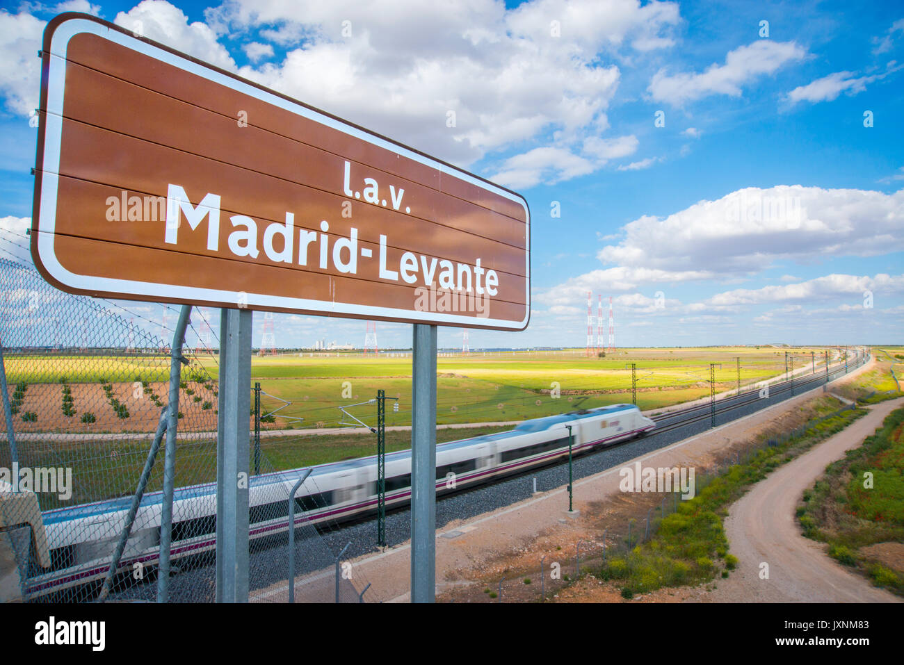 Madrid-Levante High speed line and AVE high-speed train traveling along ...