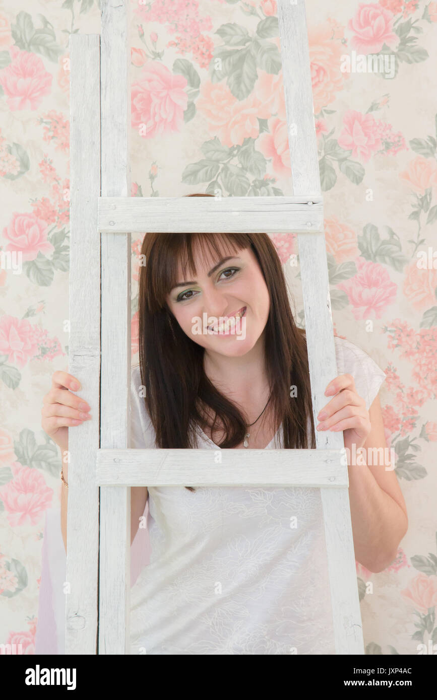 Charming young girl on a studio photo shoot Stock Photo - Alamy
