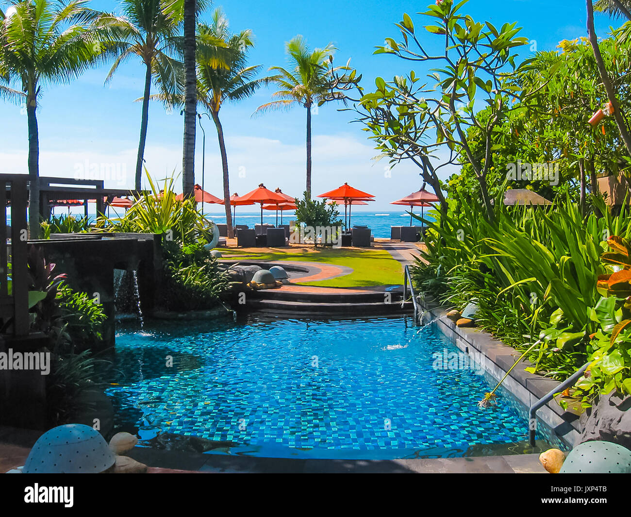 Bali, Indonesia - April 14, 2012: View of swimming pool at St. Regis ...
