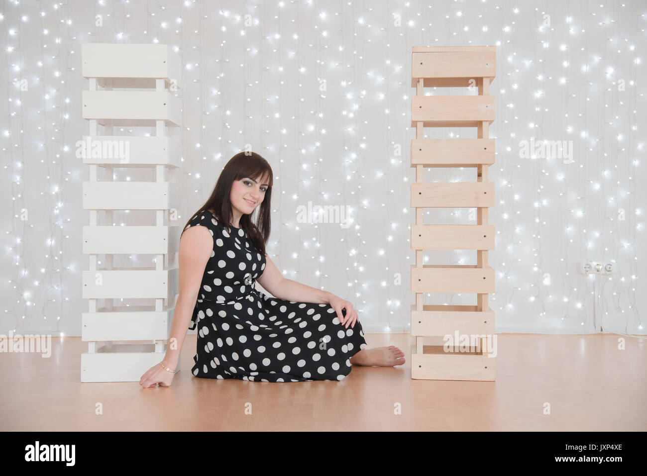 Charming young girl on a studio photo shoot Stock Photo - Alamy