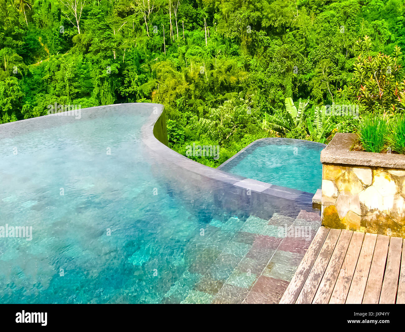 Bali, Indonesia - April 13, 2014: View of swimming pool at Ubud Hanging ...