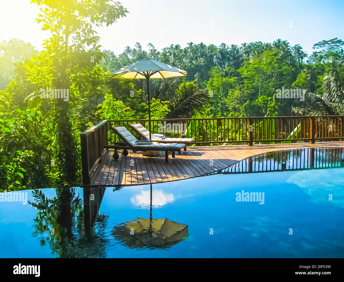 Bali, Indonesia - April 14, 2014: View of swimming pool at Nandini ...