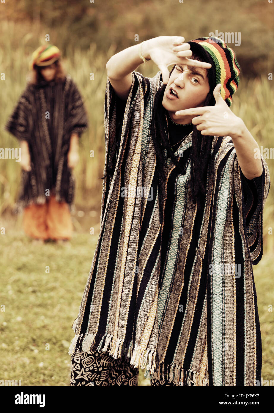 Young crazy fashion man walking on nature Stock Photo - Alamy