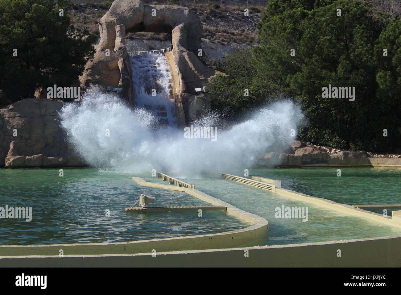 Splash from water flume Stock Photo - Alamy