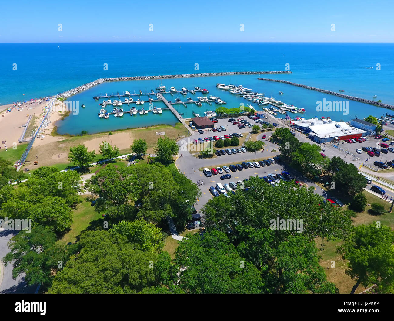 Aerial view of Lexington Michigan on Lake Huron showing a man made ...
