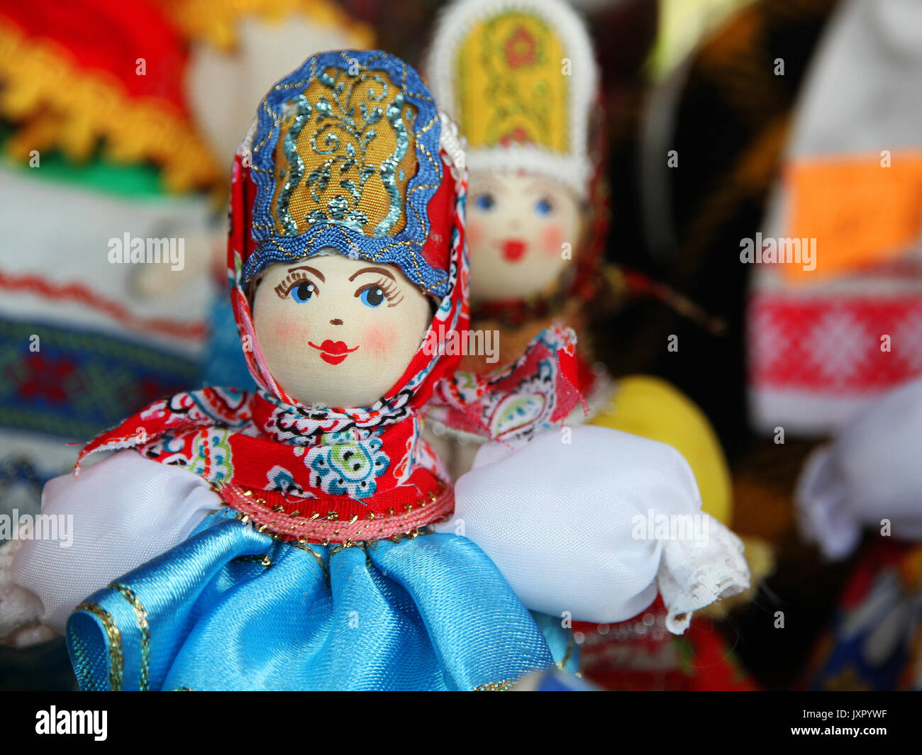 Desk at the flea market: handmade rag doll woman, in traditional ethnic ...