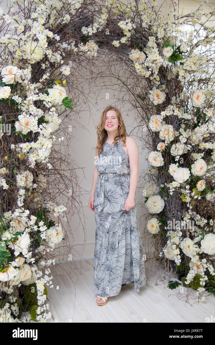 Charming young girl on a studio photo shoot Stock Photo - Alamy