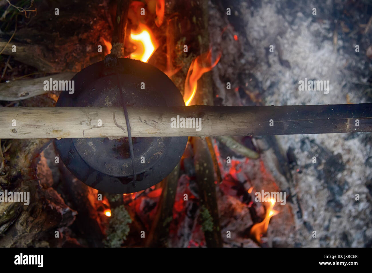 picnic in winter on nature of a bonfire. kettle for tea on coals Stock ...