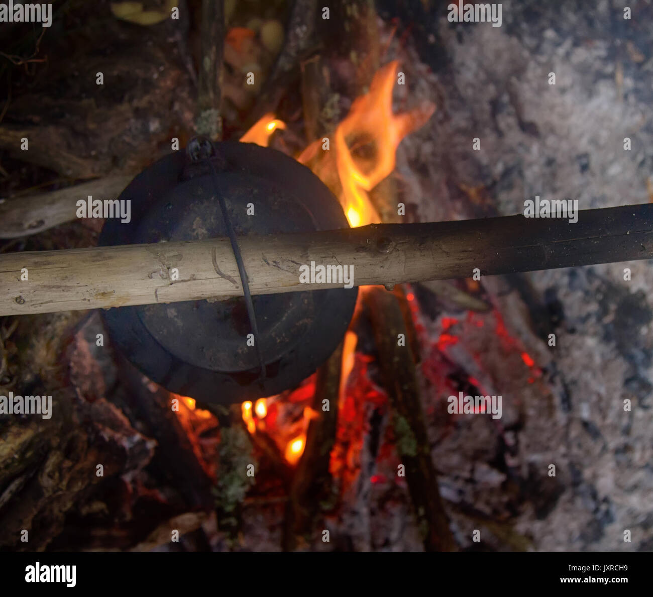 picnic in winter on nature of a bonfire. kettle for tea on coals Stock ...