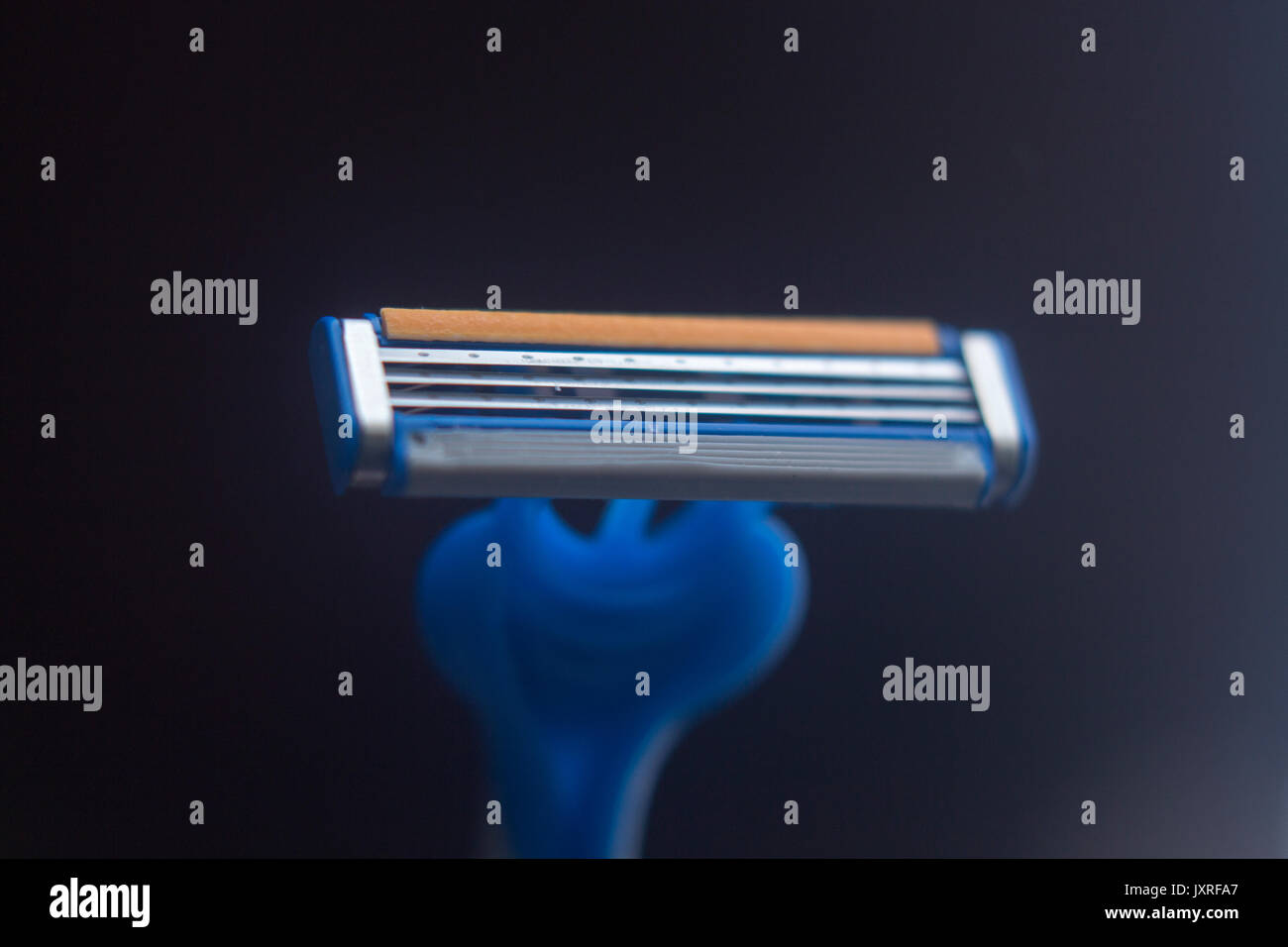 Modern safety disposable plastic shaving razor with multiple blades and ...