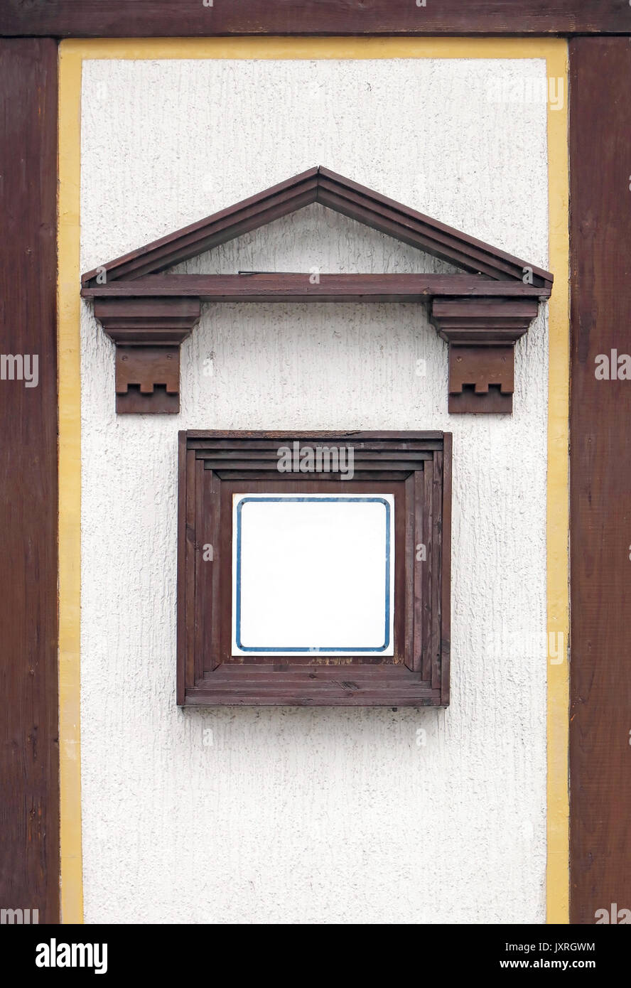 Empty info page square board on building facade Stock Photo - Alamy