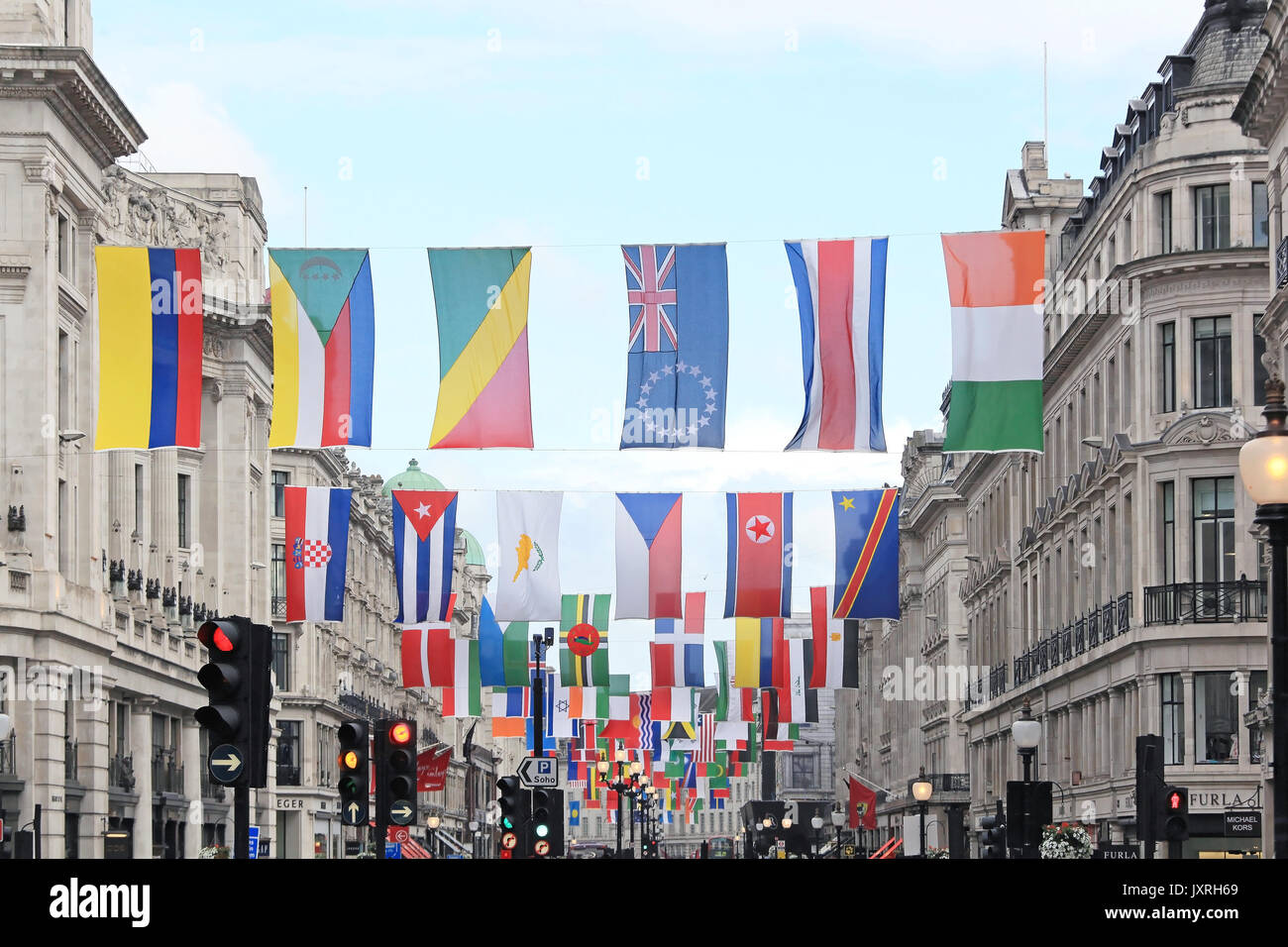 LONDON, UK - June 22: Regent Street with a stunning display of flags ...